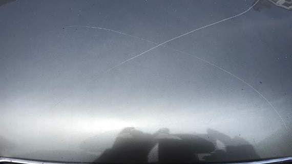 Cross scratched on car bonnet | iomtoday.co.im