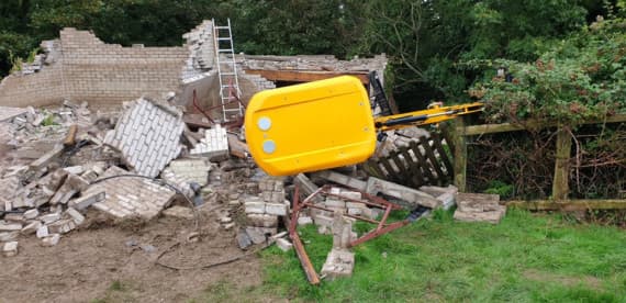 Drama as mini-digger tips over | iomtoday.co.im