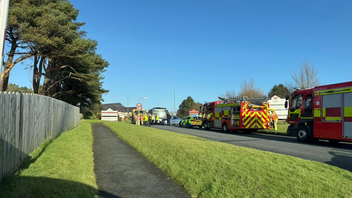 Live updates as crash involving bus and car blocks road near hospital ...