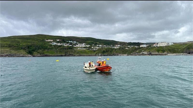 Lifeboat rescues two seasick people from stranded vessel off Isle of ...
