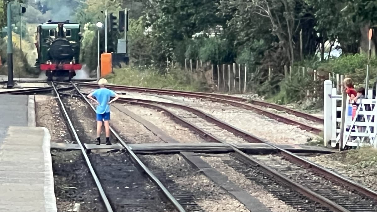 Shocking moment as kids play chicken with approaching steam train ...