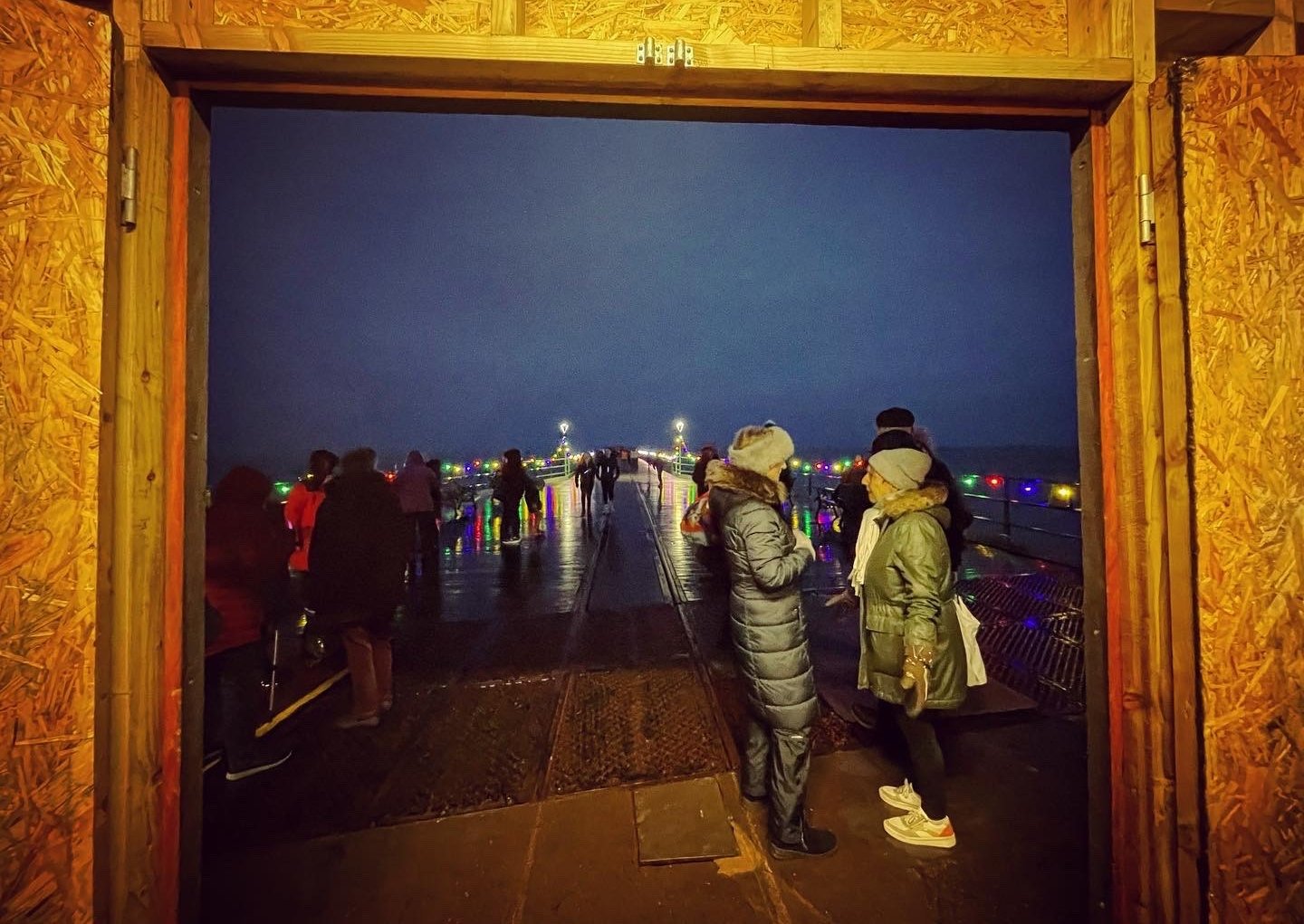 Pictures as historic pier bathed in a festive glow as the lights switch ...