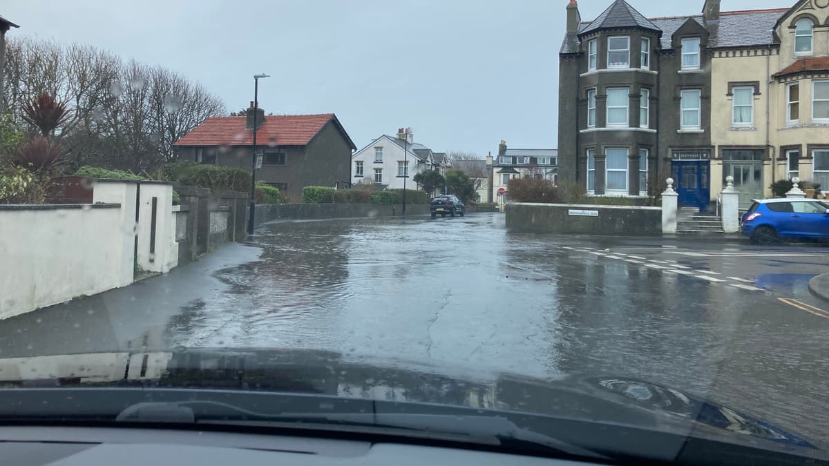 Reports of flooding as heavy rain and strong winds cause disruption ...